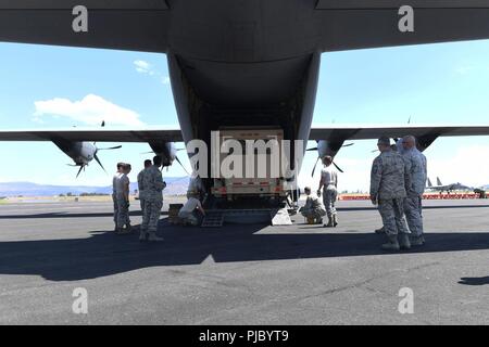 A tactical air navigation (TACAN) system van is positioned facing ...