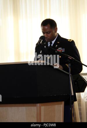 Col. Raymond A. Robinson, Jr., the USFK command chaplain, receives a ...