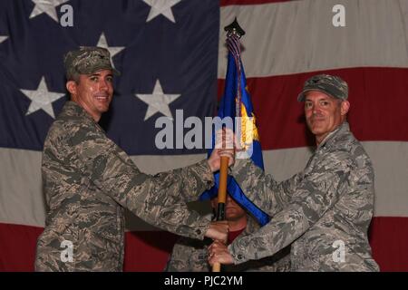 U.S. Air Force Col. Derek Salmi, left, 60th Air Mobility Wing commander ...