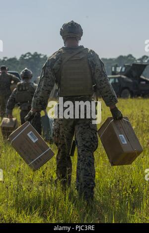 U.S. Marines eat their meals during a birthday lunch at the Anderson ...
