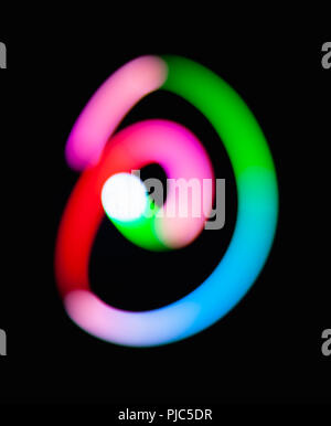 Neon hashtag sign. Light painting yellow hashtag sign against black ...