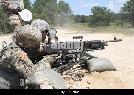 A U.S. Army Reserve Soldier qualifies with an M2 .50 caliber machine ...