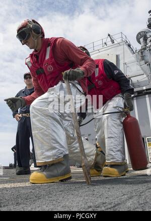 OCEAN (July 21, 2018) – Damage Controlman 3rd Class Hayden Hamblin ...