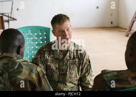Cpl. Ethan McDonald, a combat medic assigned to 576th Engineer Company ...