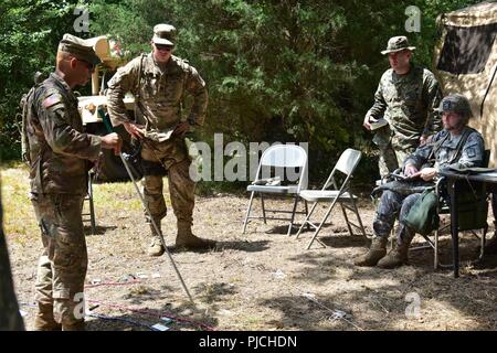 U.S. Army Lt. Col. Burton Shields and his translator, meet with village ...