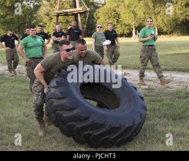 U.S. Marines with Recruiting Station Dallas, march on the colors during ...