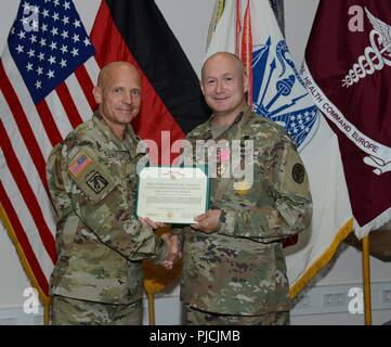U.S. Army Brig. Gen. Ronald Lewis, left, deputy commanding general of ...