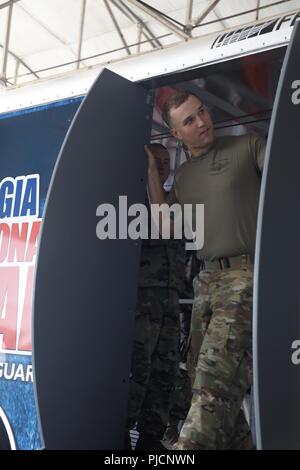 Staff Sgt. Michael Romeo, a jumpmaster assigned to the 165th ...