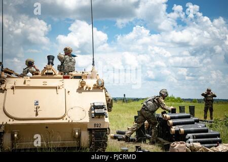 United States Army Mortar Platoons mount an attack during a D-Day re ...