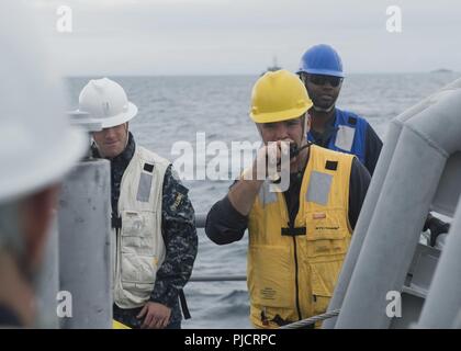 US Navy Mineman 3rd Class prepares to operate the mine neutralization ...