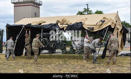 U.S. Air Force members of the 123rd Contingency Response Group, with ...