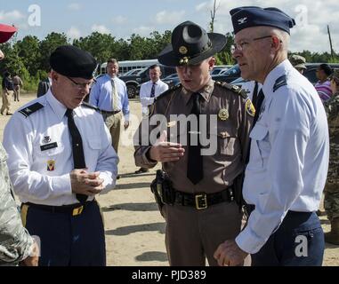 The 83rd Troop Command commander Col. George V. Brown Jr. passes the ...