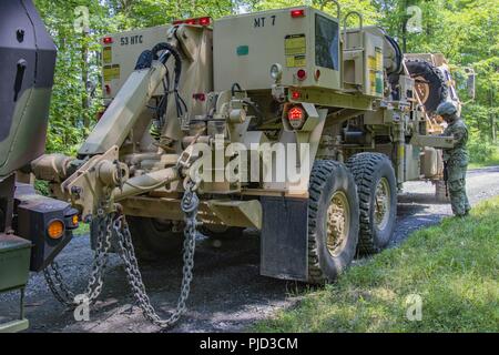 U.S. Army Spc. Johan Alvarez, a wheeled vehicle mechanic with the ...