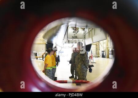 Weapons loaders from the 34th Aircraft Maintenance Unit load inert GBU ...