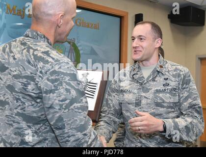 Lt. Col. Kenneth Ferland, 66th Air Base Group deputy commander, runs ...