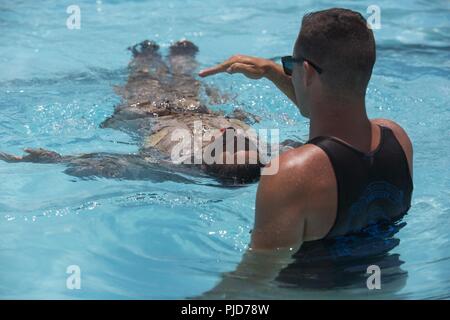 U.S. Marines tread water during the intermediate swim qualification on ...