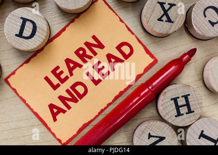 Text sign showing Learn And Lead. Conceptual photo Improve the skills ...