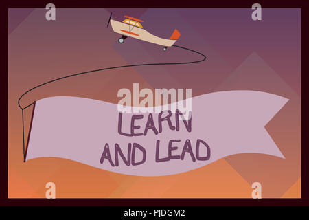 Handwriting text Learn And Lead. Concept meaning Improve the skills and ...