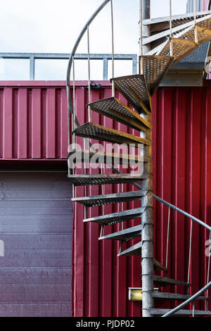 The steel staircase of the factory building is a spiral staircase for ...