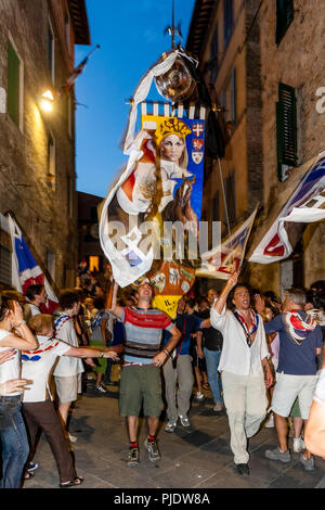 Members Of The Winning Istrice (Porcupine) Contrada Take Part In A ...