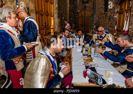 Members Of The Winning Istrice (Porcupine) Contrada Take Part In A ...