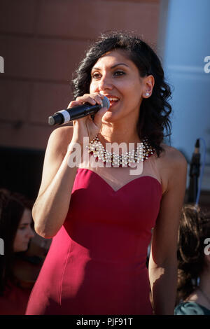 Jazz singer at gala concert. Vitebsk symphonic orchestra at open-air ...