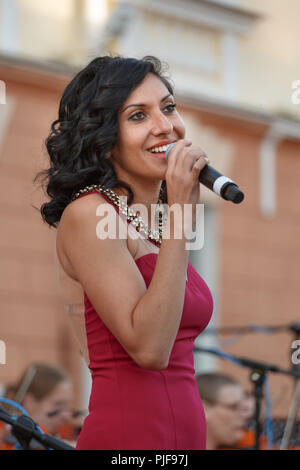Jazz singer at gala concert. Vitebsk symphonic orchestra at open-air ...