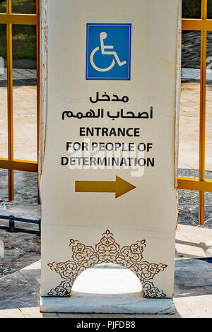 Bilingual signs for the public in Abu Dhabi, U.A.E Stock Photo - Alamy