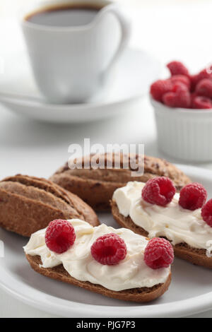 Sandwiches with rye bread, soft cheese, and raspberry Stock Photo - Alamy