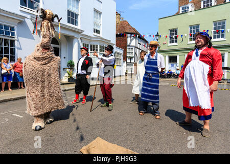 The Thameside Mummers perform a mummer play in the medieval town of ...