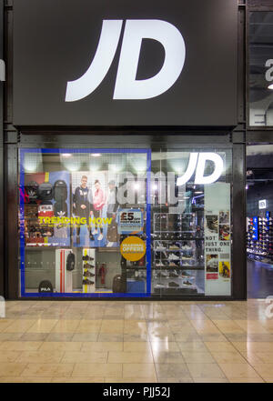 JD Sports shop front store window covered in large sign up to 50 Stock ...