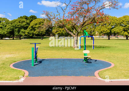 Outdoor exercise machines at public park Stock Photo - Alamy