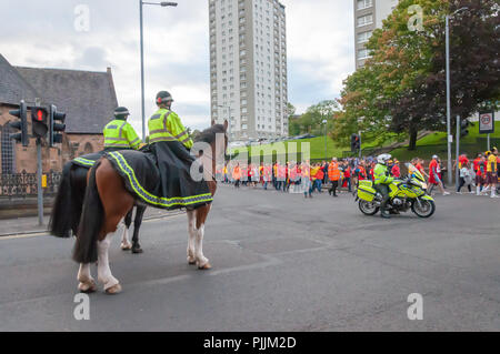 Police Scotland mounted officers on patrol during the 2014 Edinburgh ...