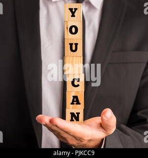 Hand of Businessman holding motivational message Stock Photo - Alamy