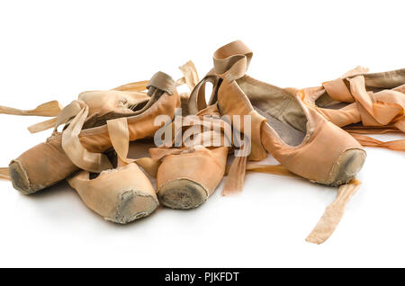 A bunch of old used ballet shoes isolated on white background Stock ...