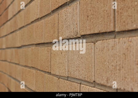 Running bond brick patterning on exterior wall of apartment building in ...