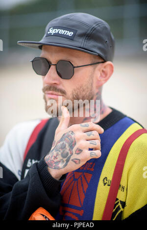 A guest arrives on Day Three during Paris Fashion Week Spring/Summer ...