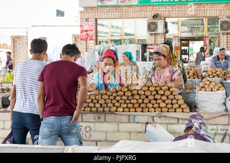 MARGILAN, UZBEKISTAN - AUGUST 24, 2018: People at local fruit and ...