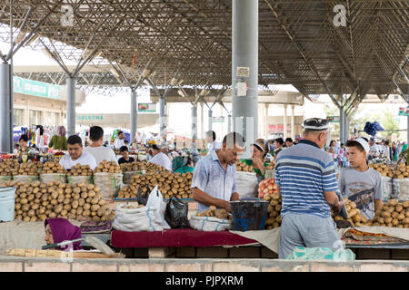 MARGILAN, UZBEKISTAN - AUGUST 24, 2018: People at local fruit and ...