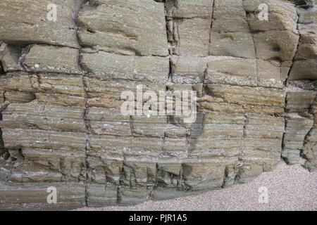 Marine sandstone interbedded with volcanic deposits at Ferriter's Cove ...
