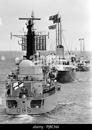 UK ENGLAND SPITHEAD Royal Yacht Britannia sails past Cunard liner RMS ...