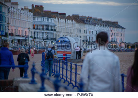 A forensics Scene of Crime Officer SOCO examines a crime scene while ...
