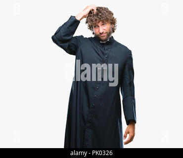 Religion concept. Handsome hispanic catholic priest man over black ...