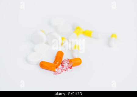 Broken medical pill Stock Photo - Alamy