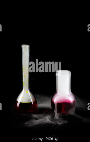 Laboratory chemistry experiment with foam and steaming.Laboratory ...