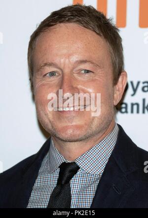 Jake Scott, director of "American Woman," poses with his wife Leigh at ...
