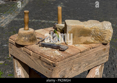 Stonemason tools hammer and chisel outdoors Stock Photo - Alamy