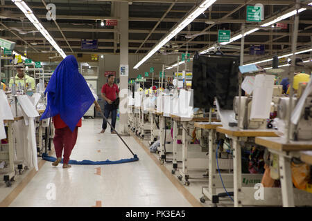 factory worker cleaning floor Stock Photo - Alamy