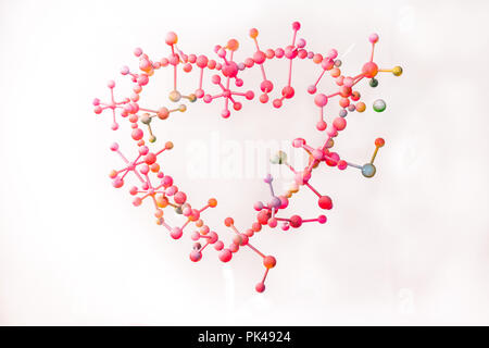 molecular of love with harmony on colors in atom Stock Photo - Alamy
