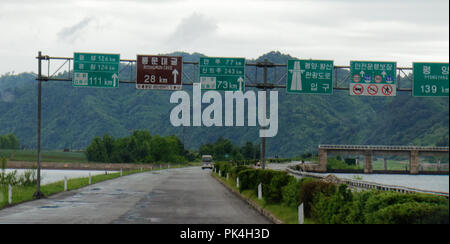 Dual language road signs in Morocco Stock Photo - Alamy